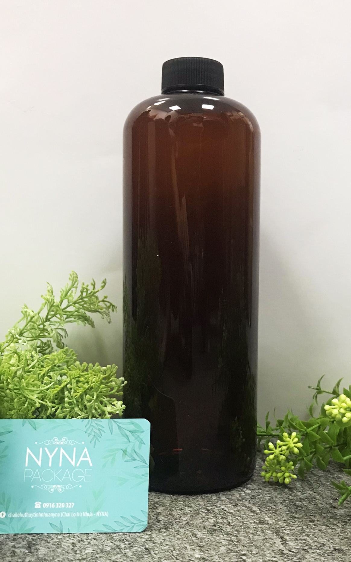 Chai nâu 1 lít nắp vặn đen P33 – BAO BÌ NYNA