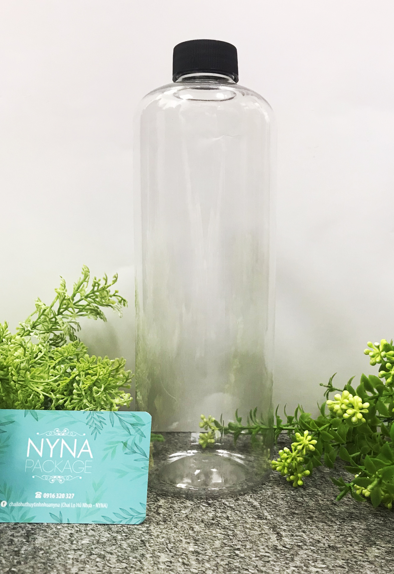 Chai trong 1 lít nắp vặn đen P33 – BAO BÌ NYNA